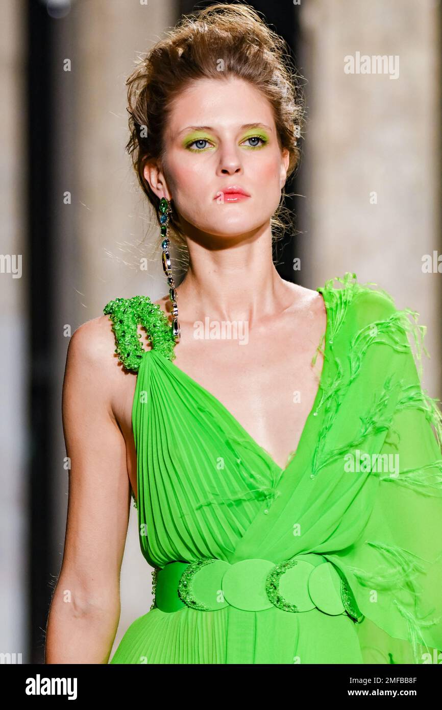 A model walks the runway at the Georges Chakra Haute Couture Spring ...