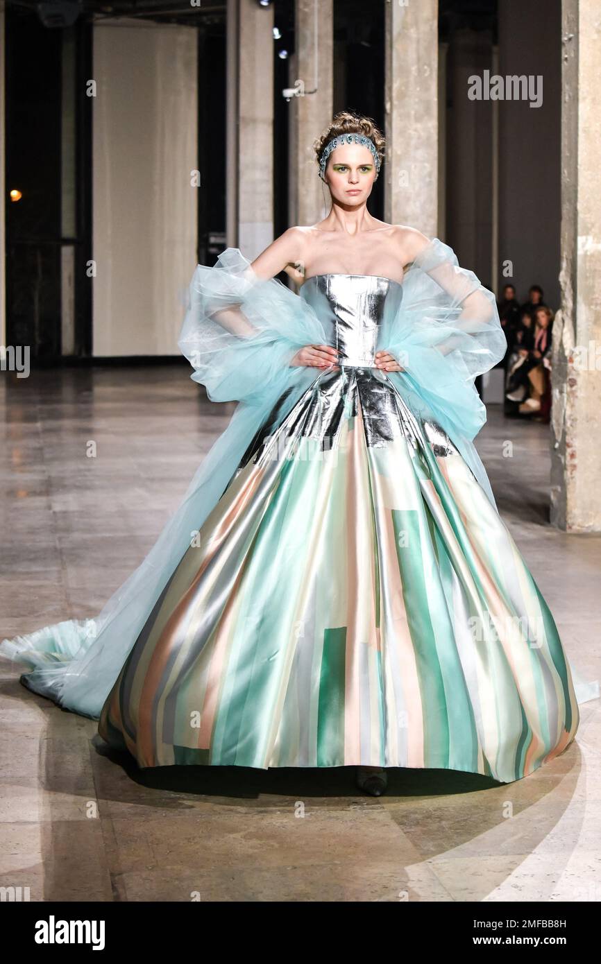 A model walks the runway at the Georges Chakra Haute Couture Spring ...