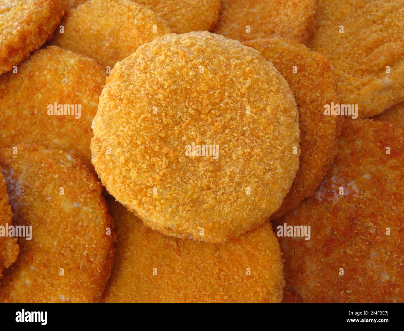 Clouseup background of fresh crispy fried fish cutlets Stock Photo - Alamy