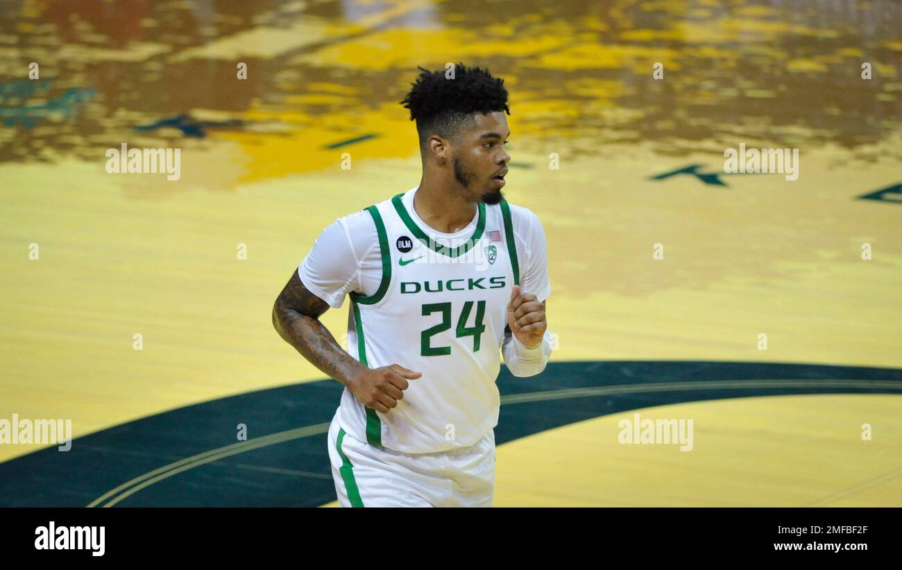 Oregon guard Aaron Estrada (24) runs up the floor during the second ...