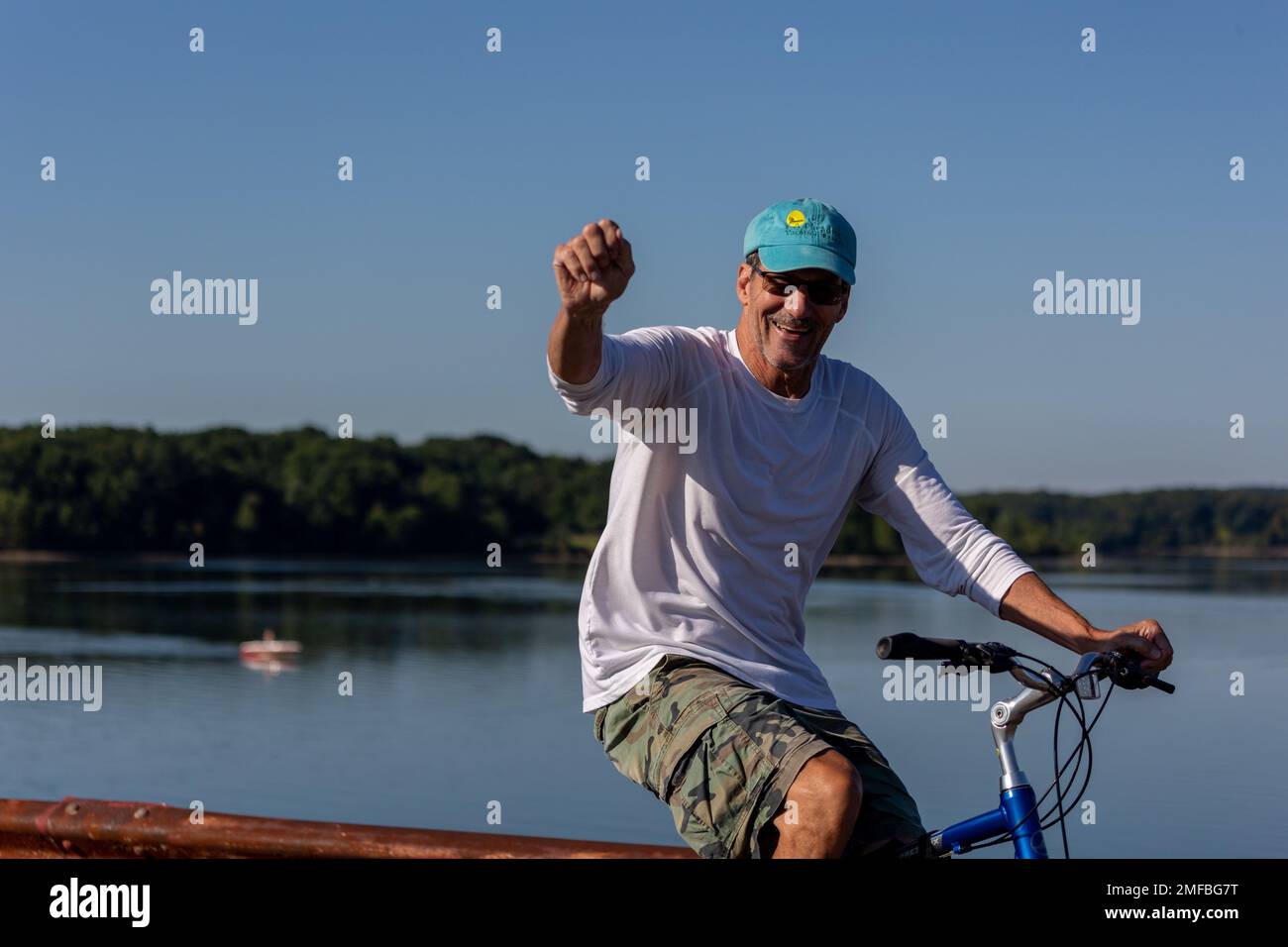 A visitor rides a bike along the Michael J. Kirwan and Reservoir in ...