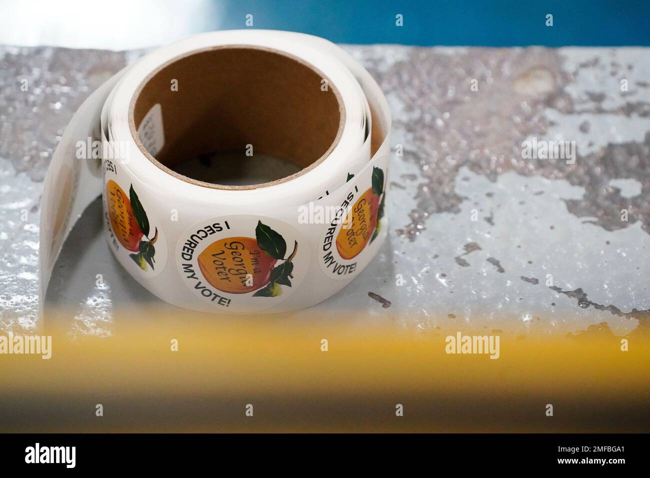 A Georgia voter sticker is displayed during Georgia's Senate runoff ...