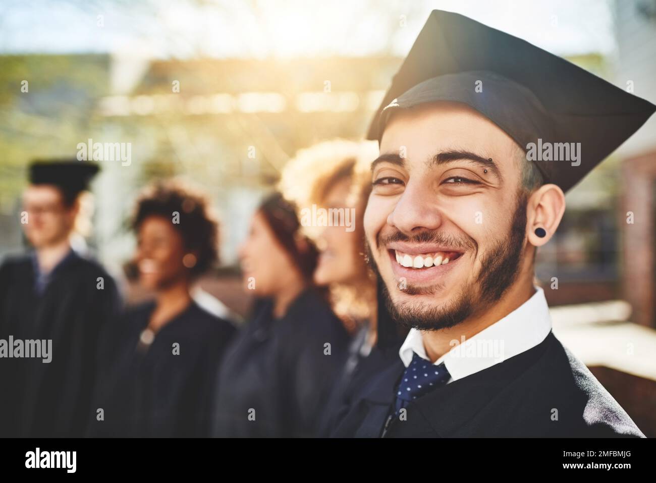 In the end, its all worth it. a smiling university student on ...