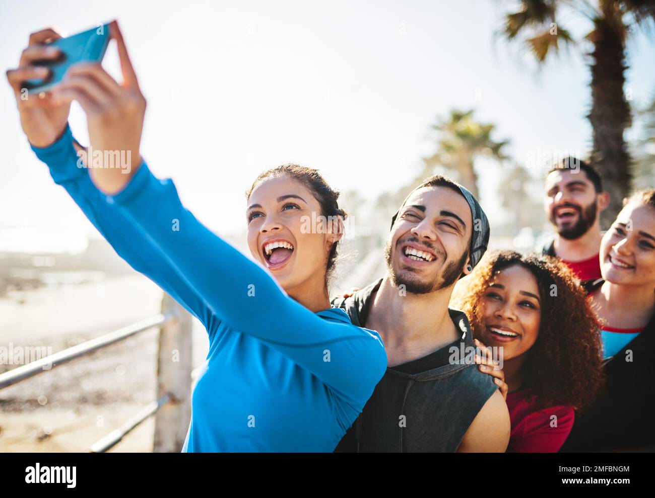 They make training more fun. a fitness group taking a selfie while out ...