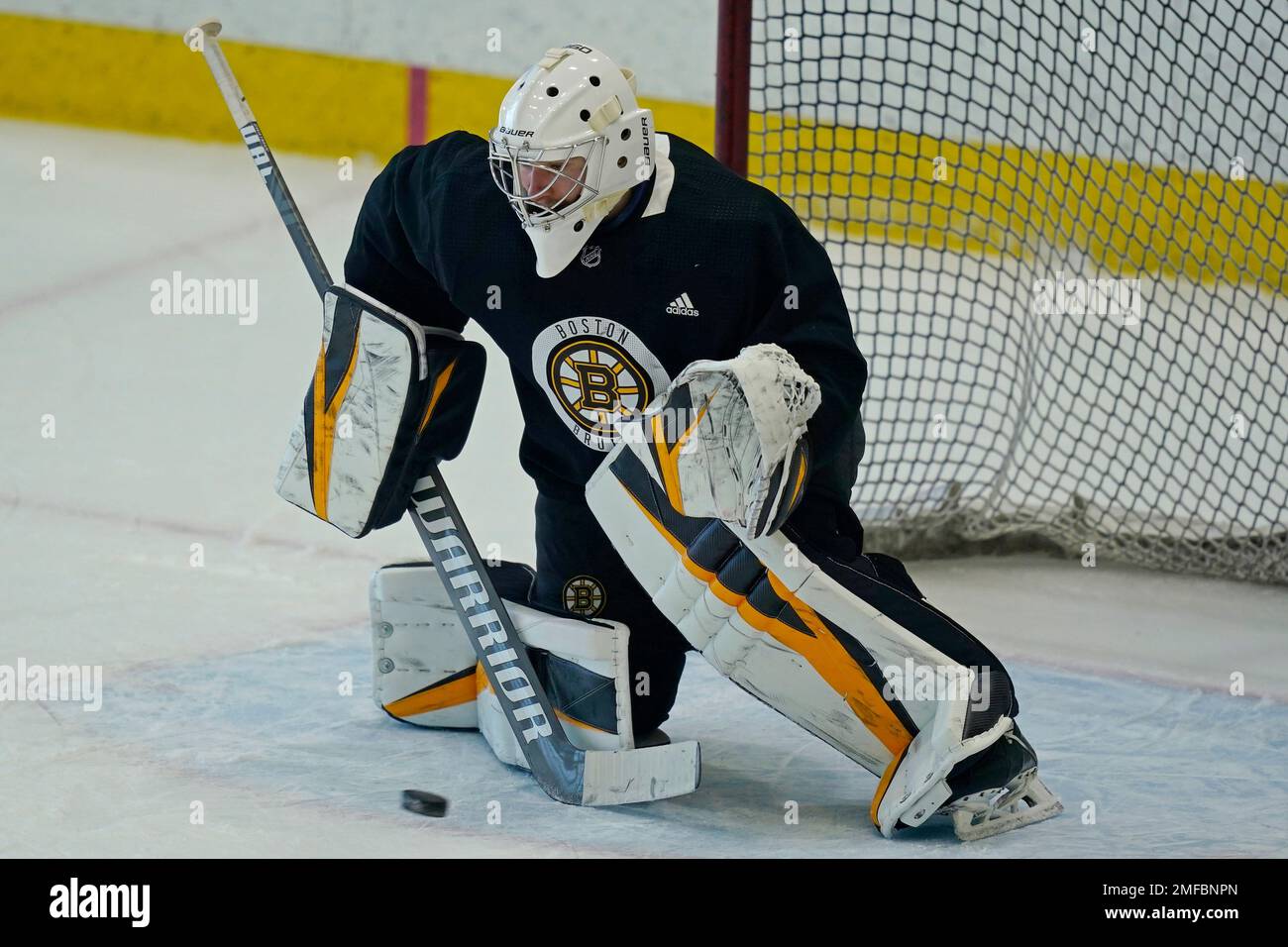 Boston Bruins goaltender Jeremy Swayman makes a save during NHL hockey ...