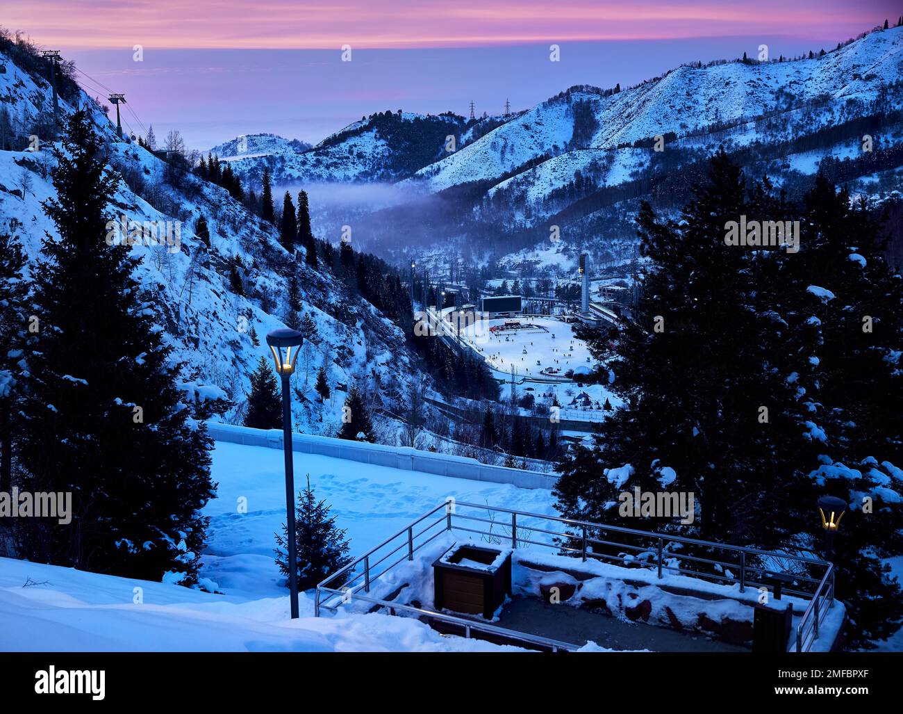 Landscape of glowing Medeu skating rink from top view of stairs health ...