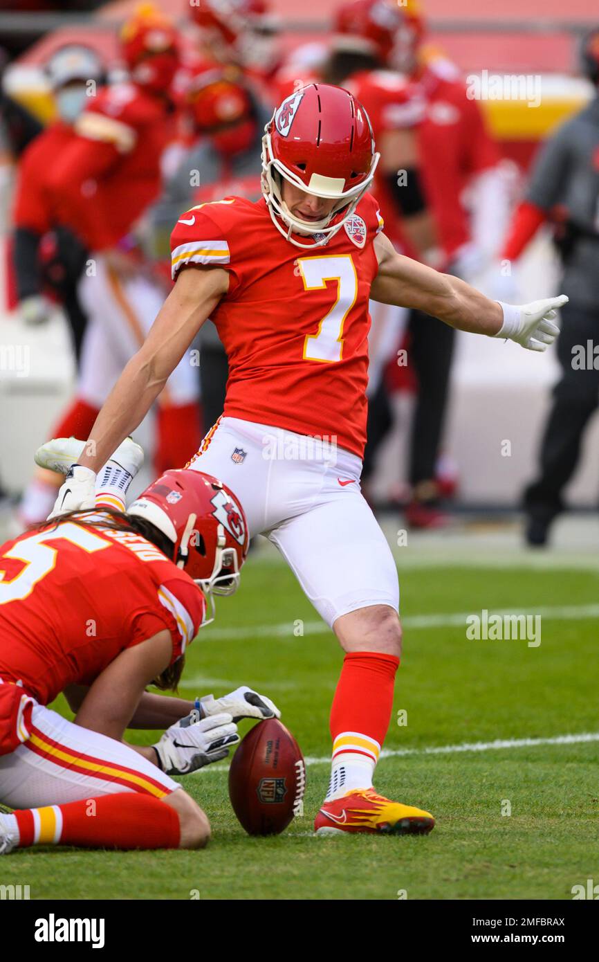 Kansas City Chiefs place kicker Harrison Butker (7) kicks a point after ...
