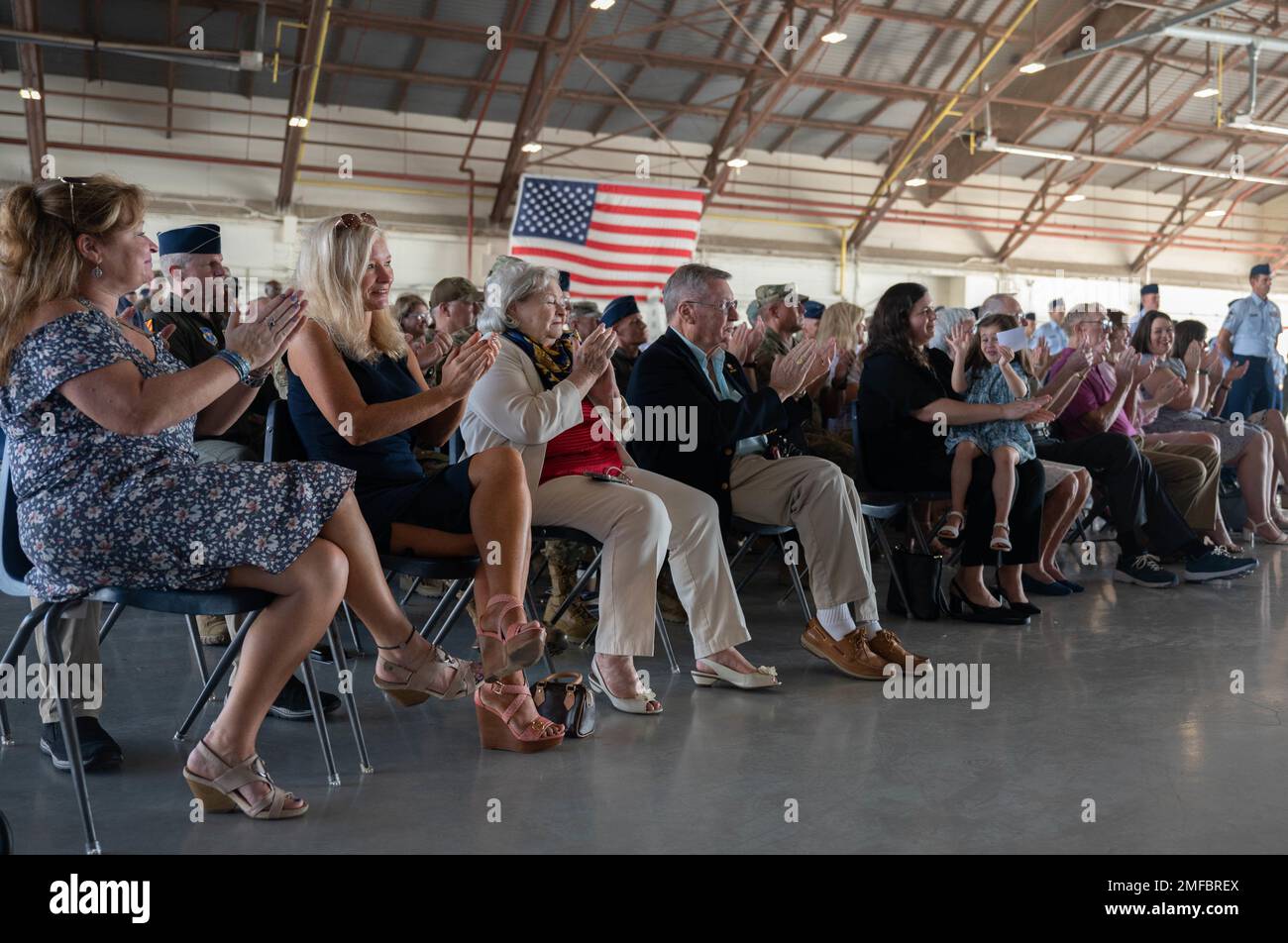 Family members of the official party clap during the 19th Air Force ...