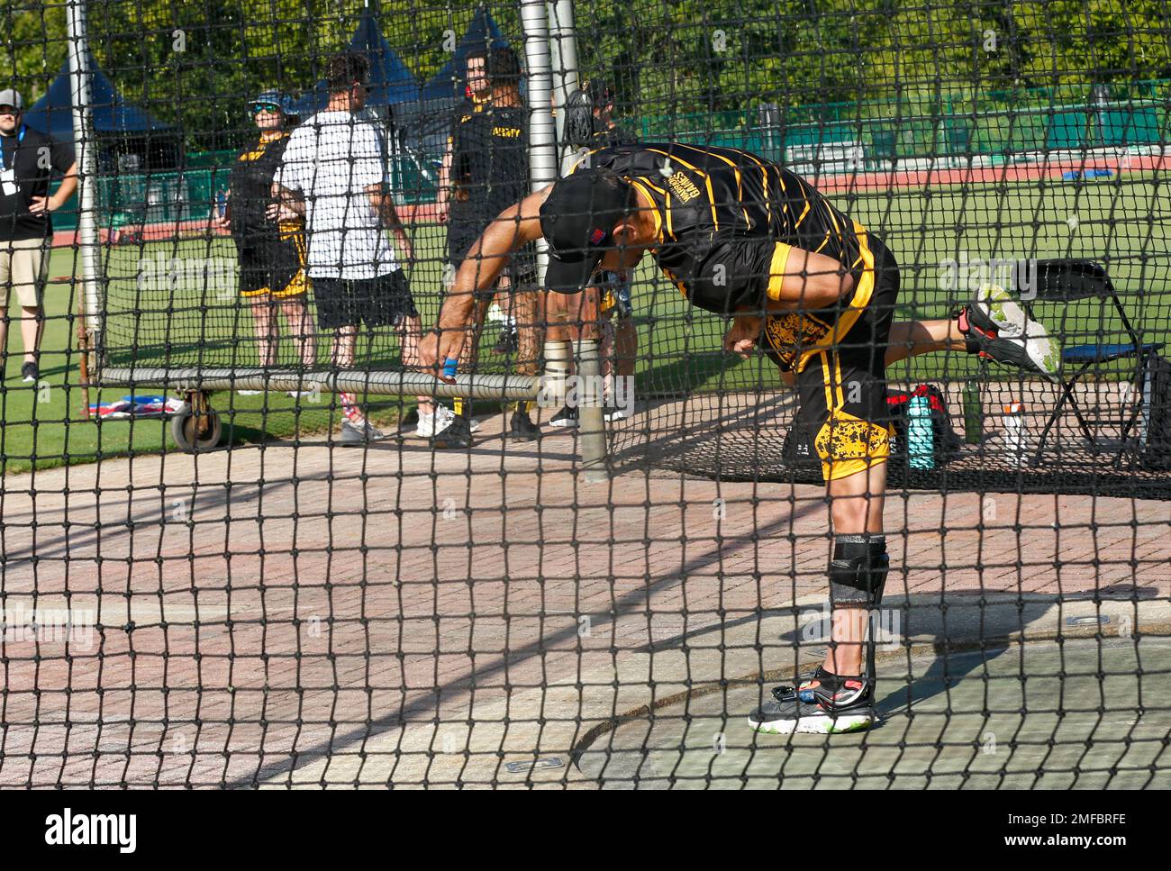 Members of Team Army practice throwing the discus at the ESPN Sports ...