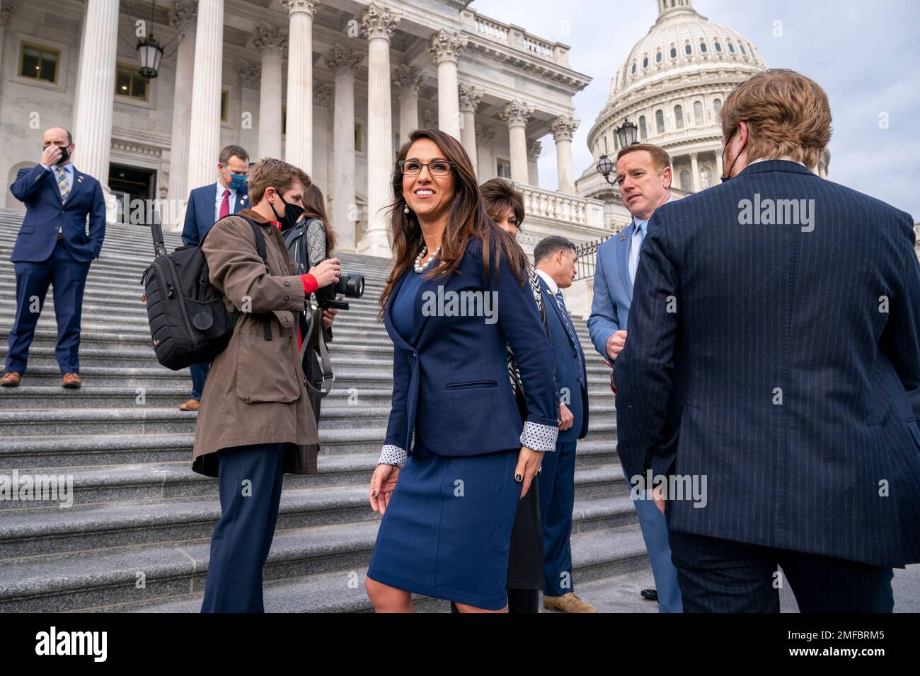 Rep. Lauren Boebert, R-Colo., center, smiles after joining other ...