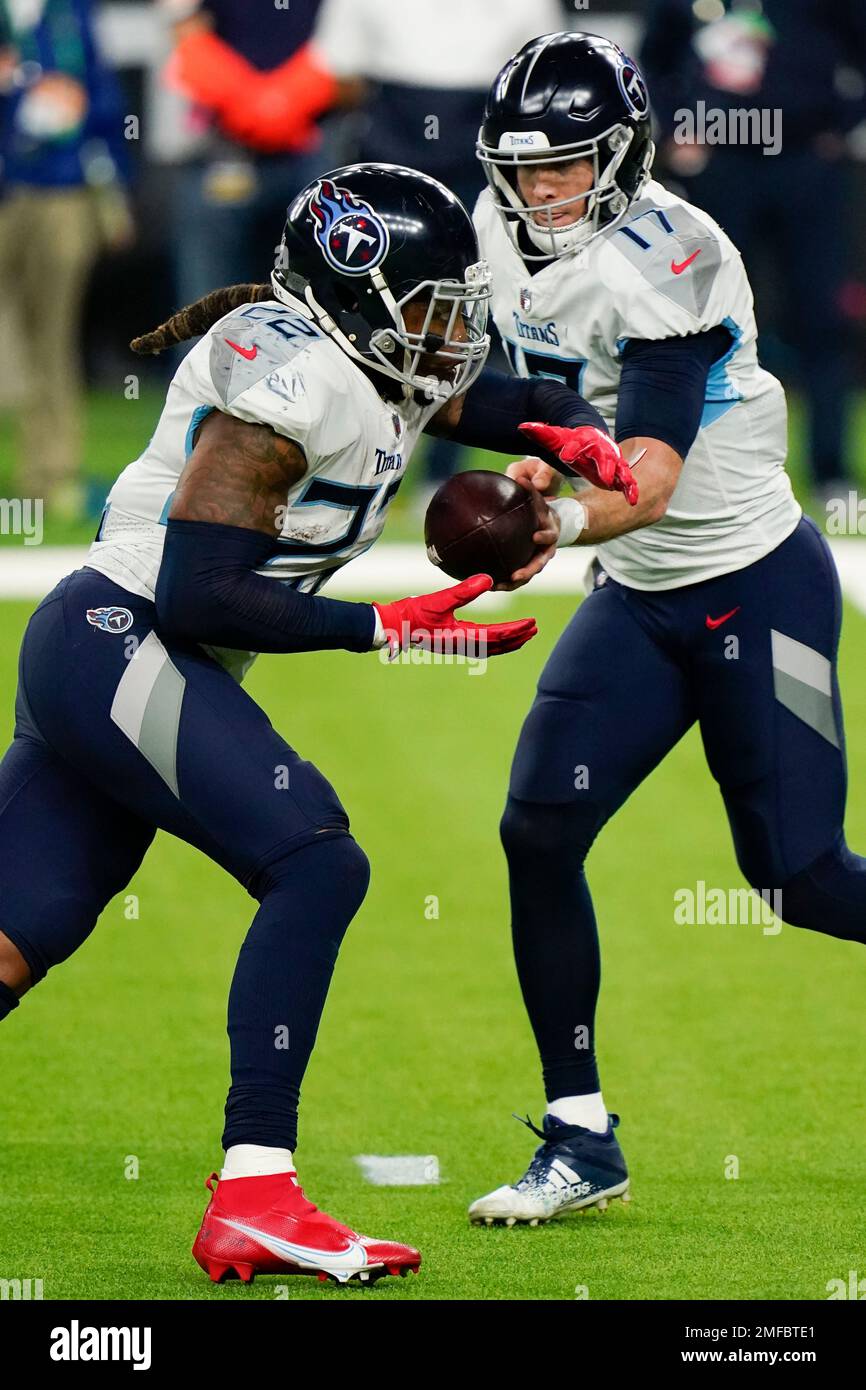 Tennessee Titans running back Derrick Henry (22) takes the handoff ...