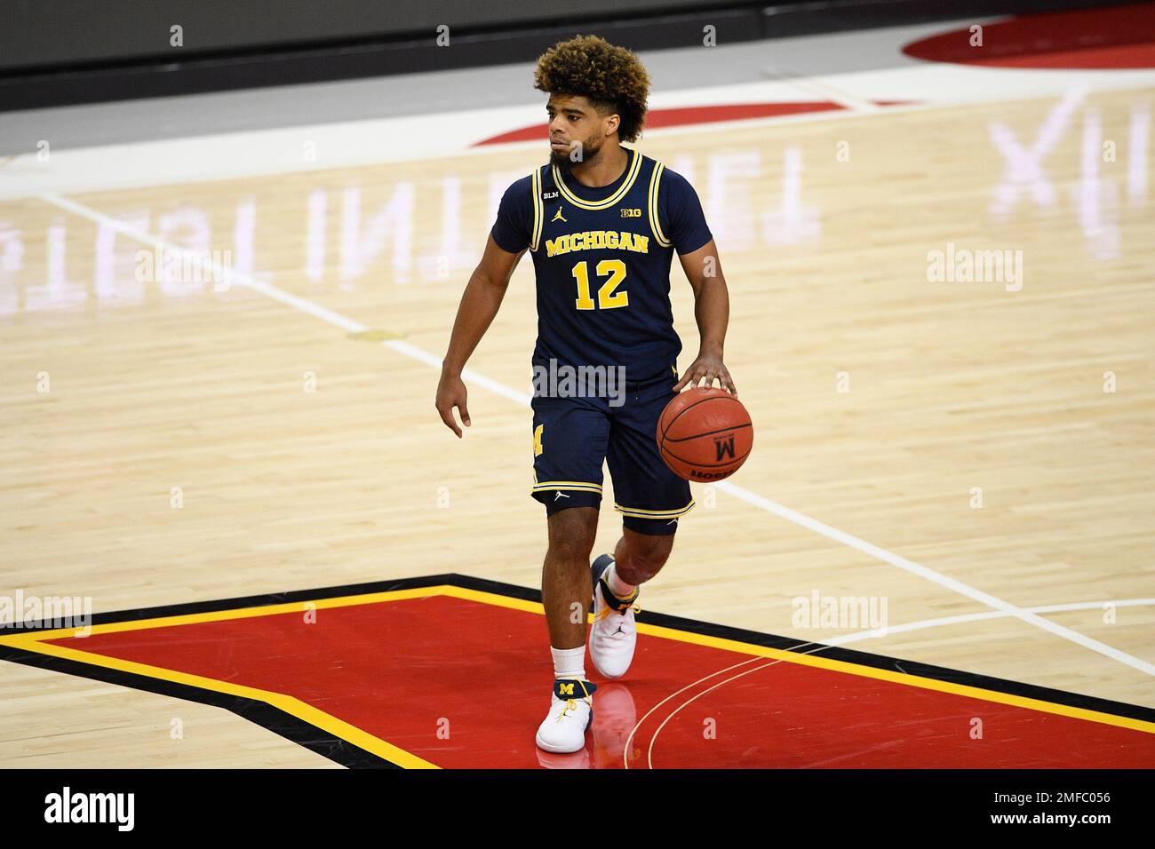 Michigan guard Mike Smith (12) in action during the first half of an ...