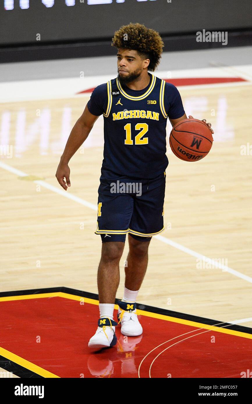 Michigan guard Mike Smith (12) in action during the first half of an ...