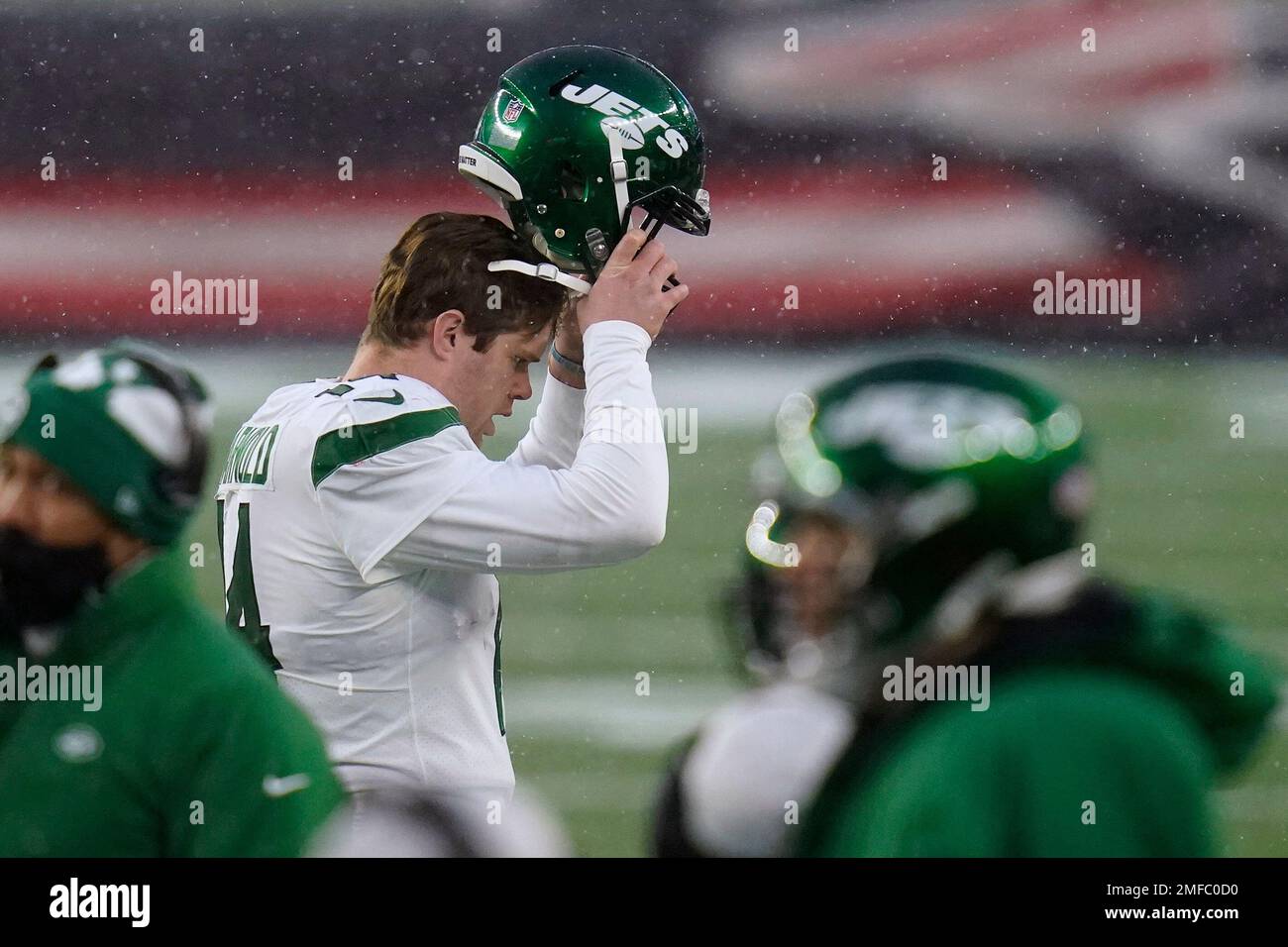 New York Jets quarterback Sam Darnold reacts after throwing an interception in the end zone in ...