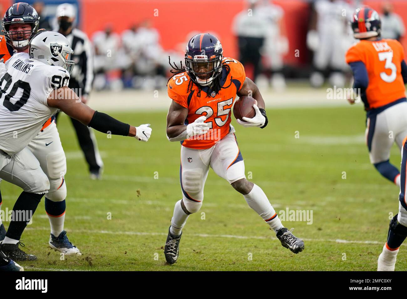 Denver Broncos running back Melvin Gordon (25) runs against the Las ...