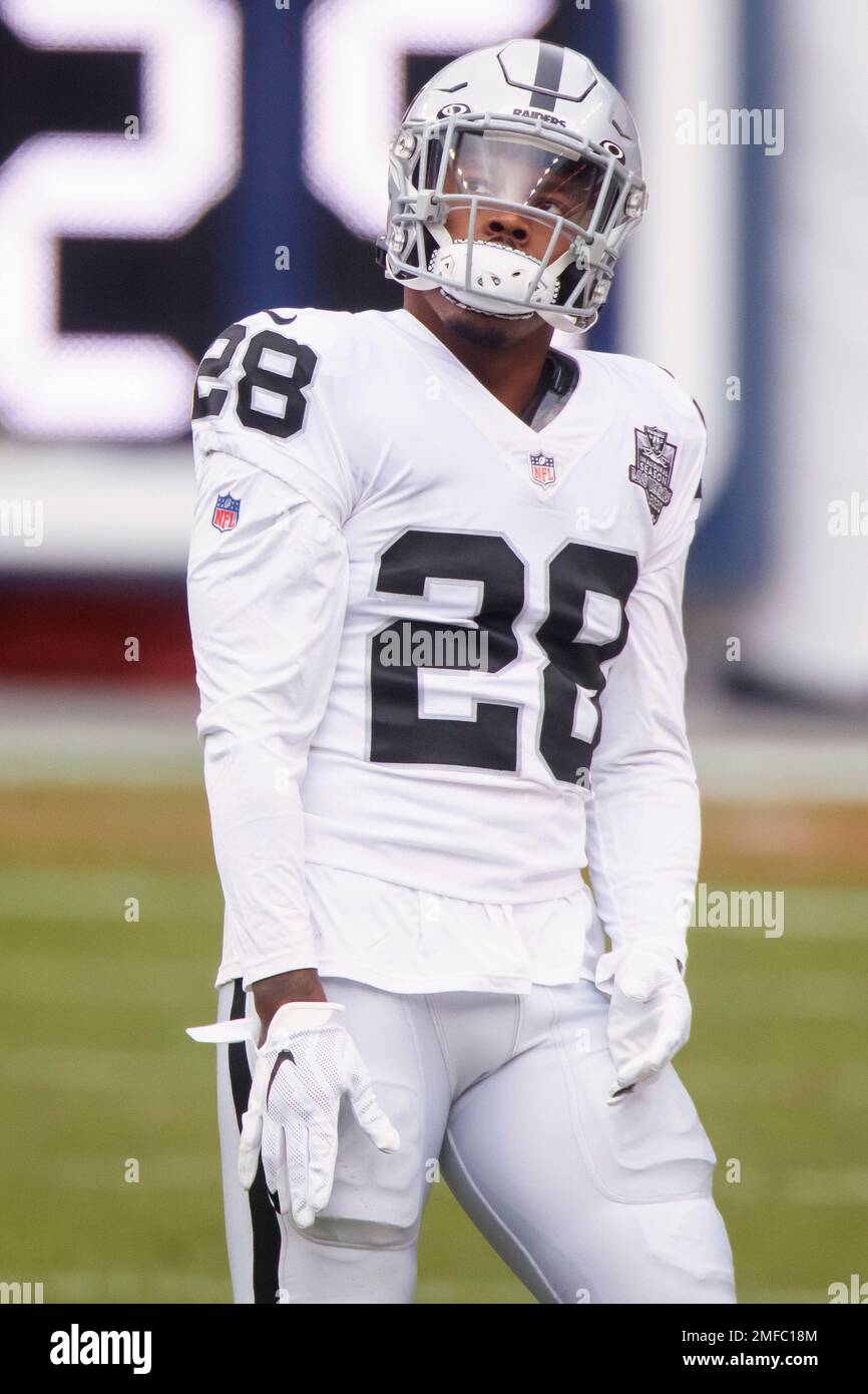 Las Vegas Raiders running back Josh Jacobs (28) walks into the field ...