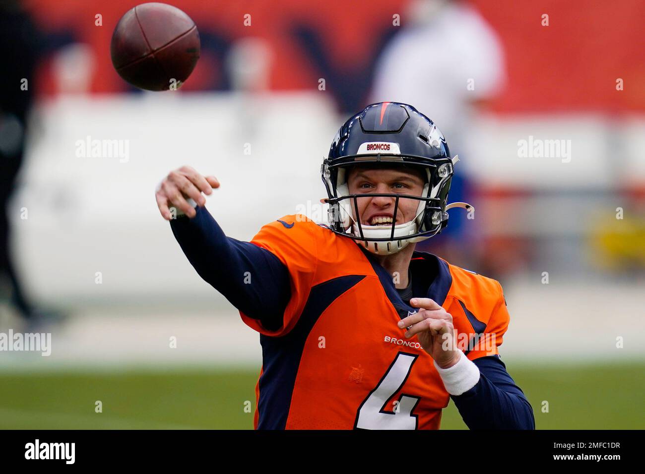 Denver Broncos quarterback Brett Rypien (4) warms up before an NFL ...