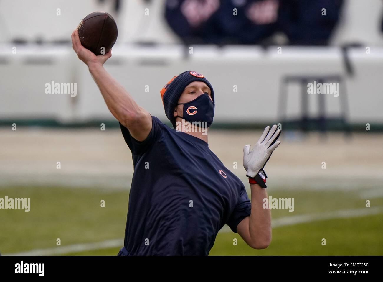 Chicago Bears' Nick Foles warms up before an NFL football game against ...