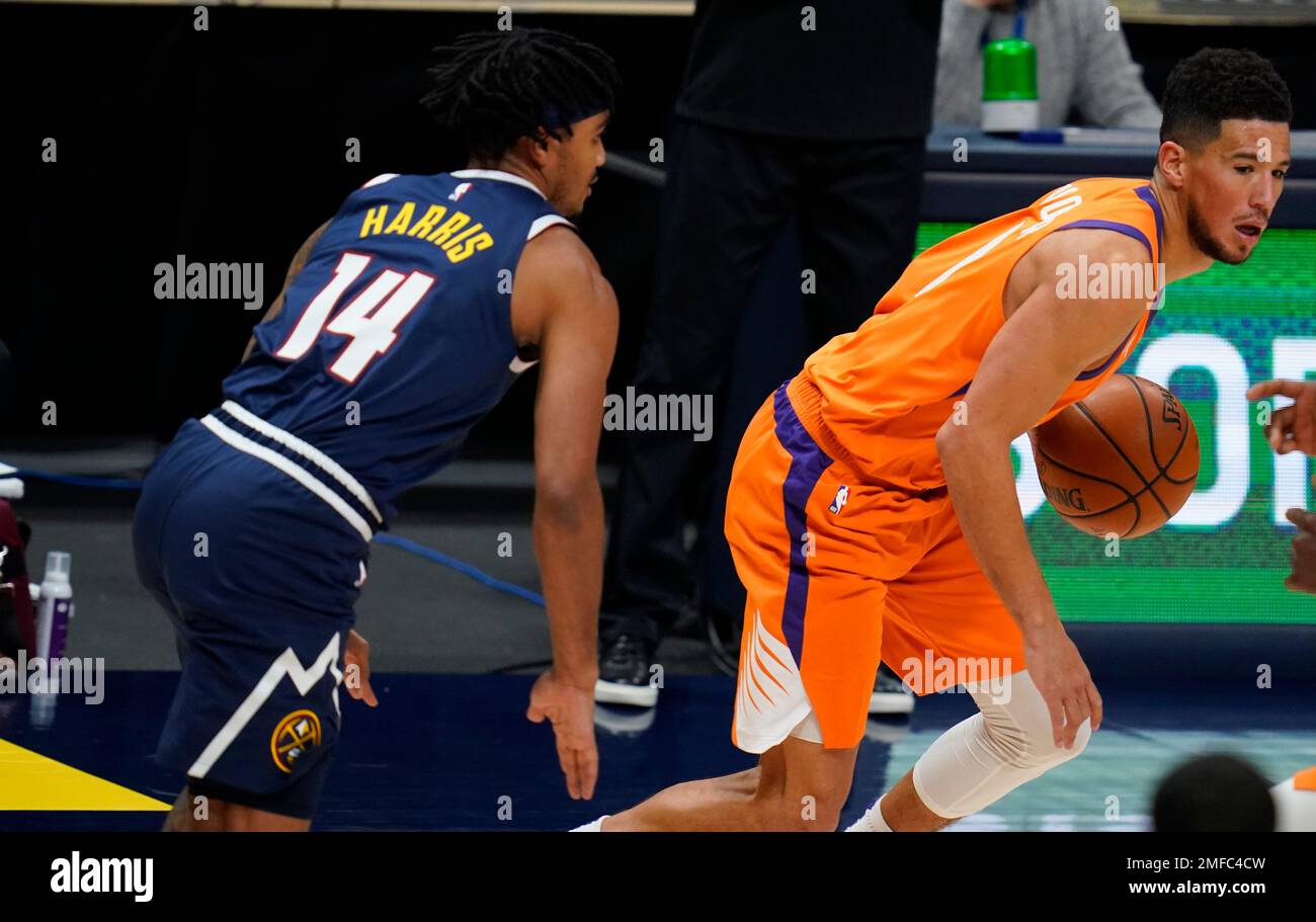 Phoenix Suns guard Devin Booker (1) in the first half of an NBA ...