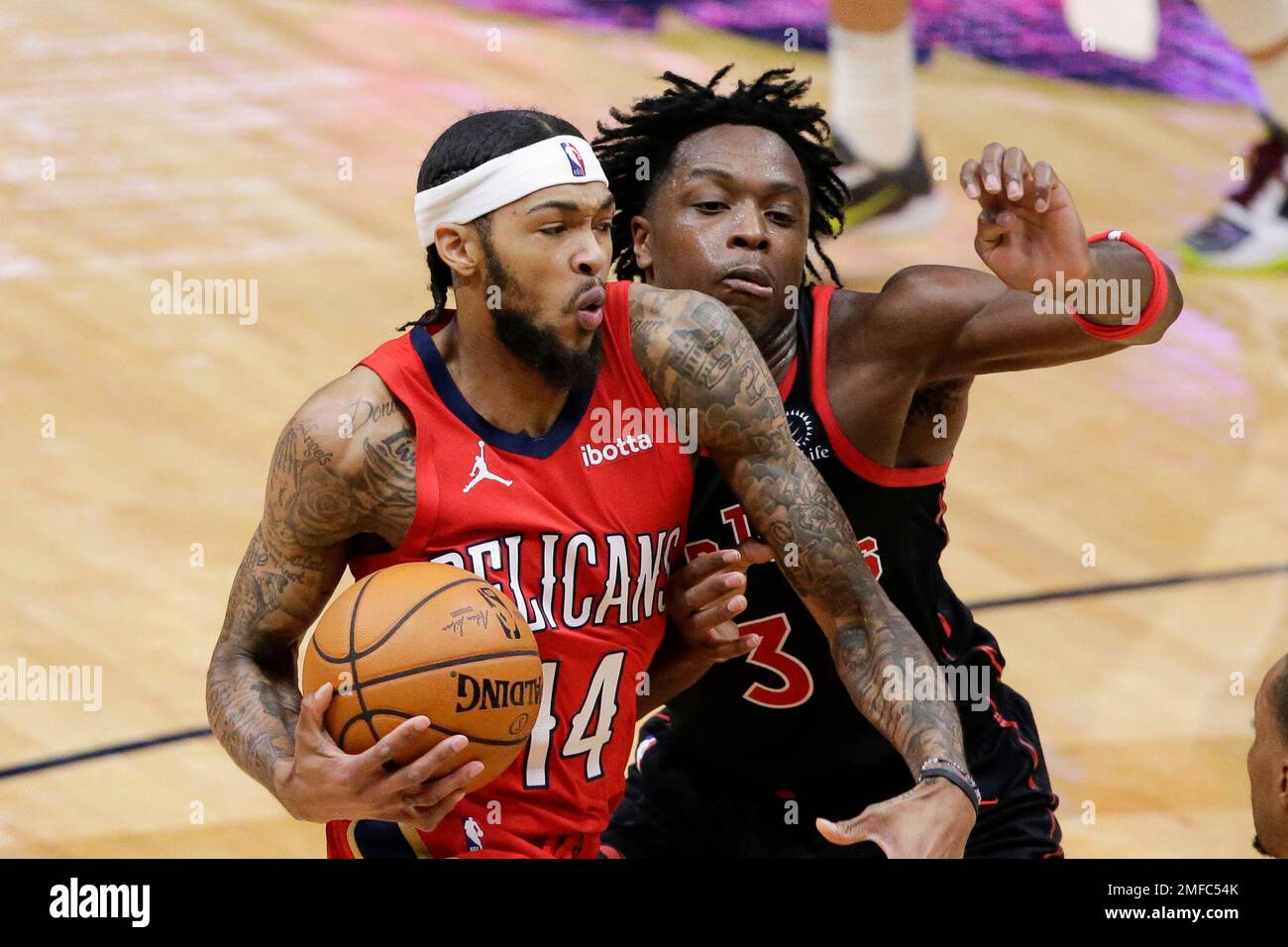 New Orleans Pelicans forward Brandon Ingram (14) drives to the basket ...