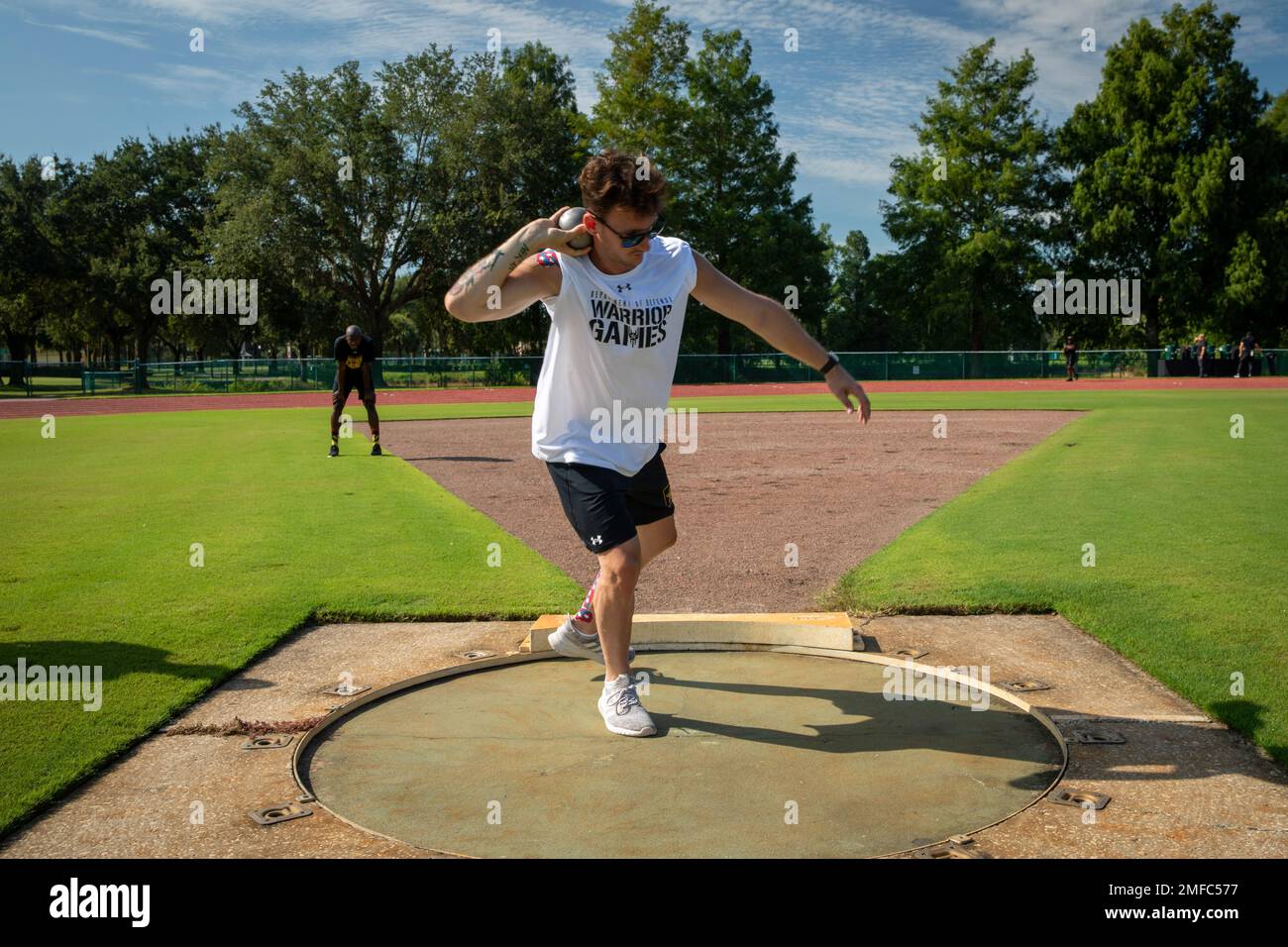 U.S. Army Spc. Justin Anderson practices throwing the discus for Team ...