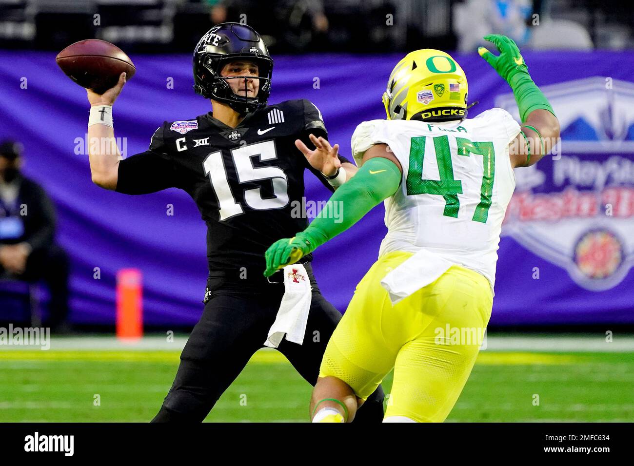 Iowa State quarterback Brock Purdy (15) throws under pressure from ...
