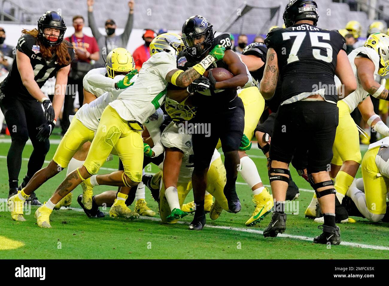 Iowa State running back Breece Hall (28) scores a touchdown as Oregon ...