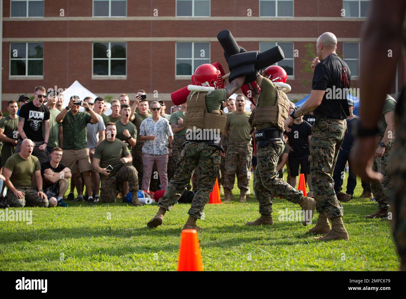 U.S. Marines with Marine Corps Security Force Regiment (MCSFR), compete in a pugil stick ...