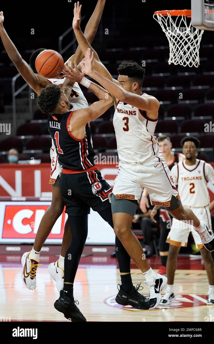 Utah's Timmy Allen(1) is defended by Southern California's Isaiah ...