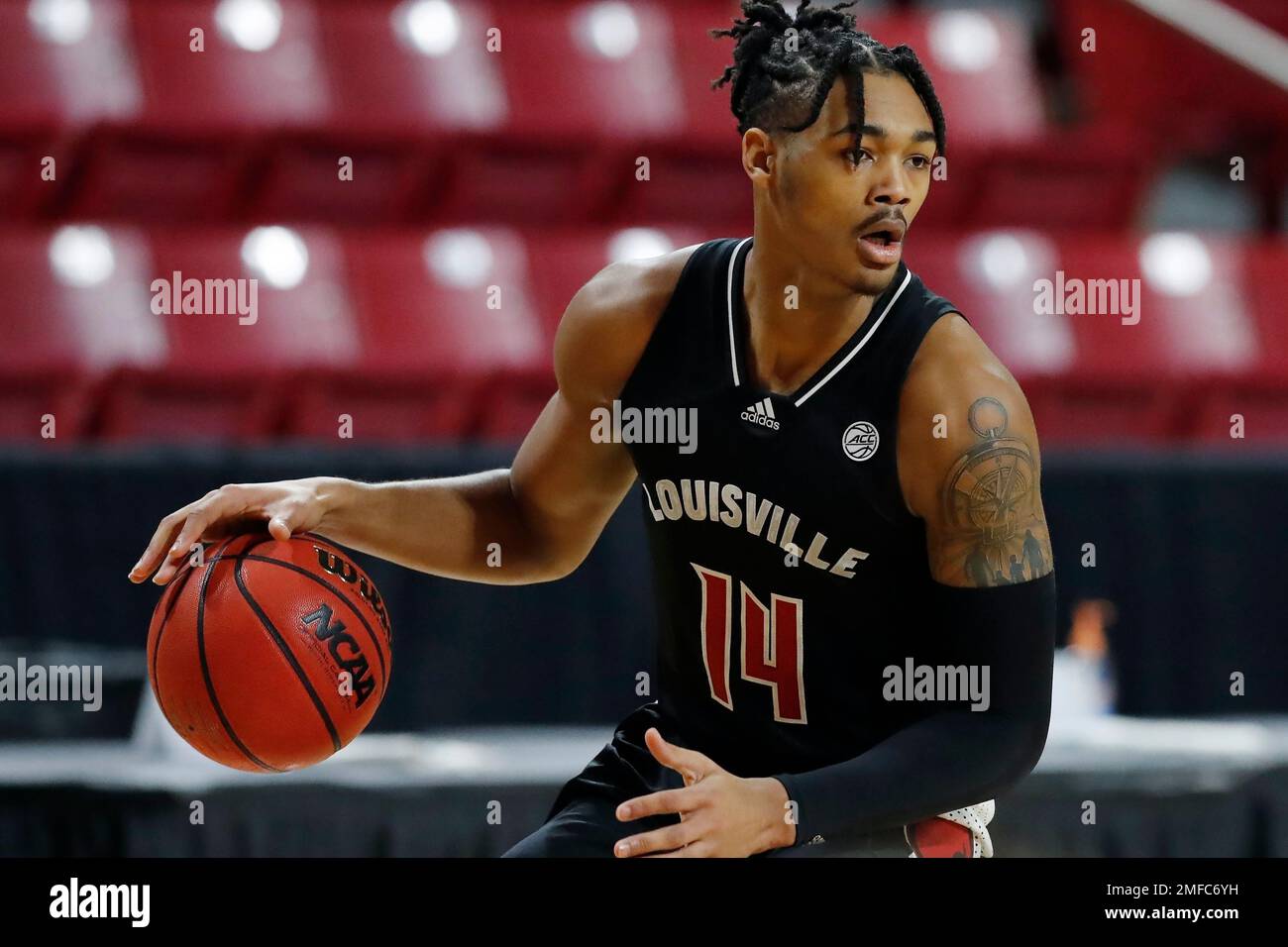 Louisville's Dre Davis plays against Boston College during the first ...