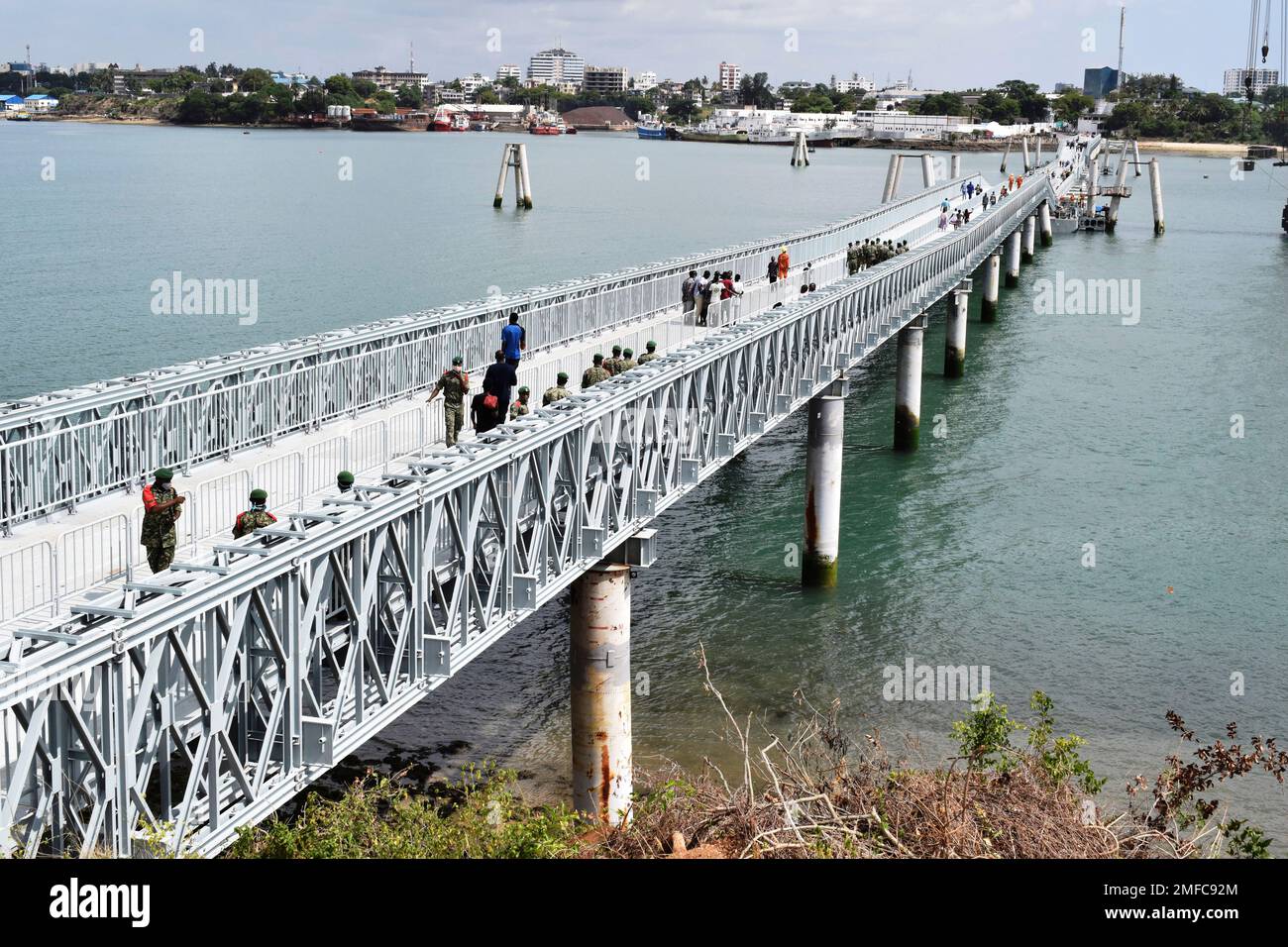 Members of the public walk across the newly commissioned Liwatoni ...