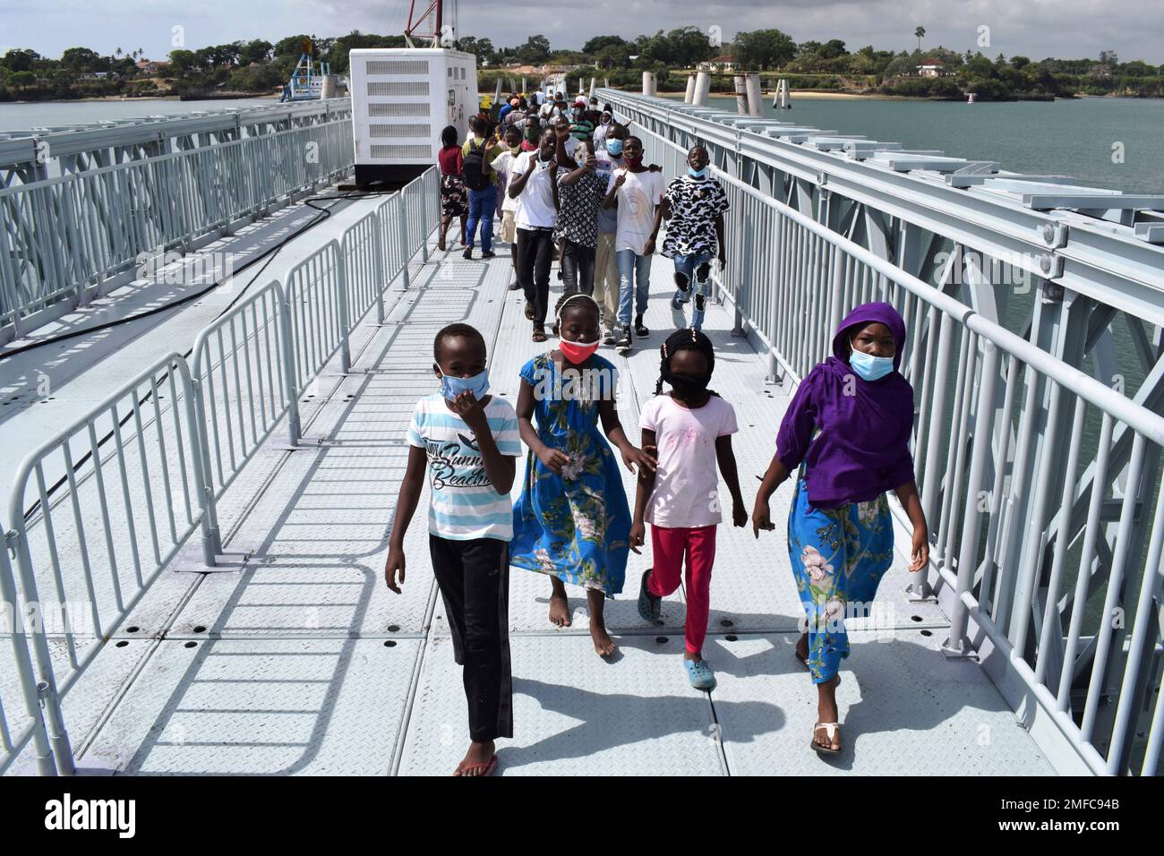 Members of the public walk across the newly commissioned Liwatoni ...