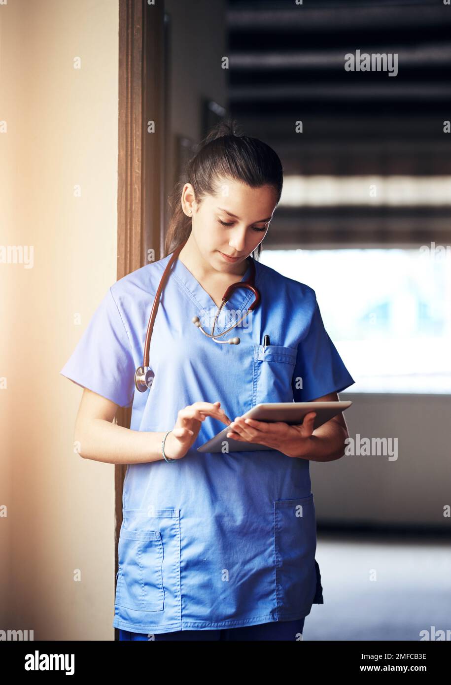 Saving lives with modern technology. a female nurse working on a ...