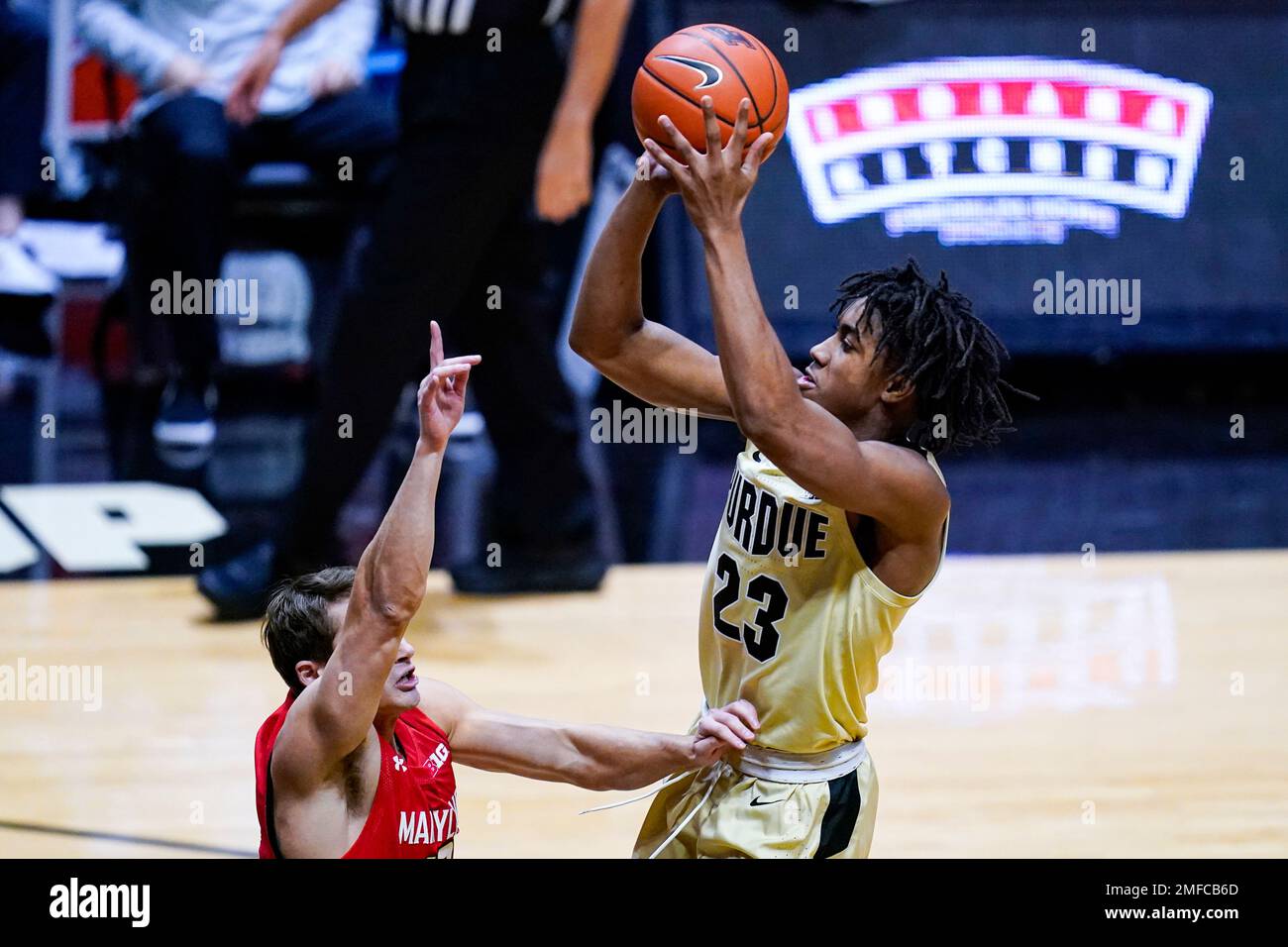 Purdue guard Jaden Ivey (23) shoots over Maryland guard Reese Mona (12 ...