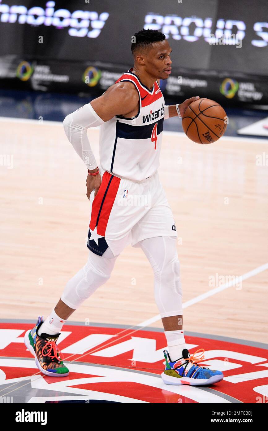 Washington Wizards guard Russell Westbrook (4) dribbles the ball during ...