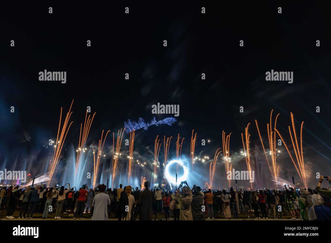 Crowd celebrating and watching fireworks Stock Photo - Alamy