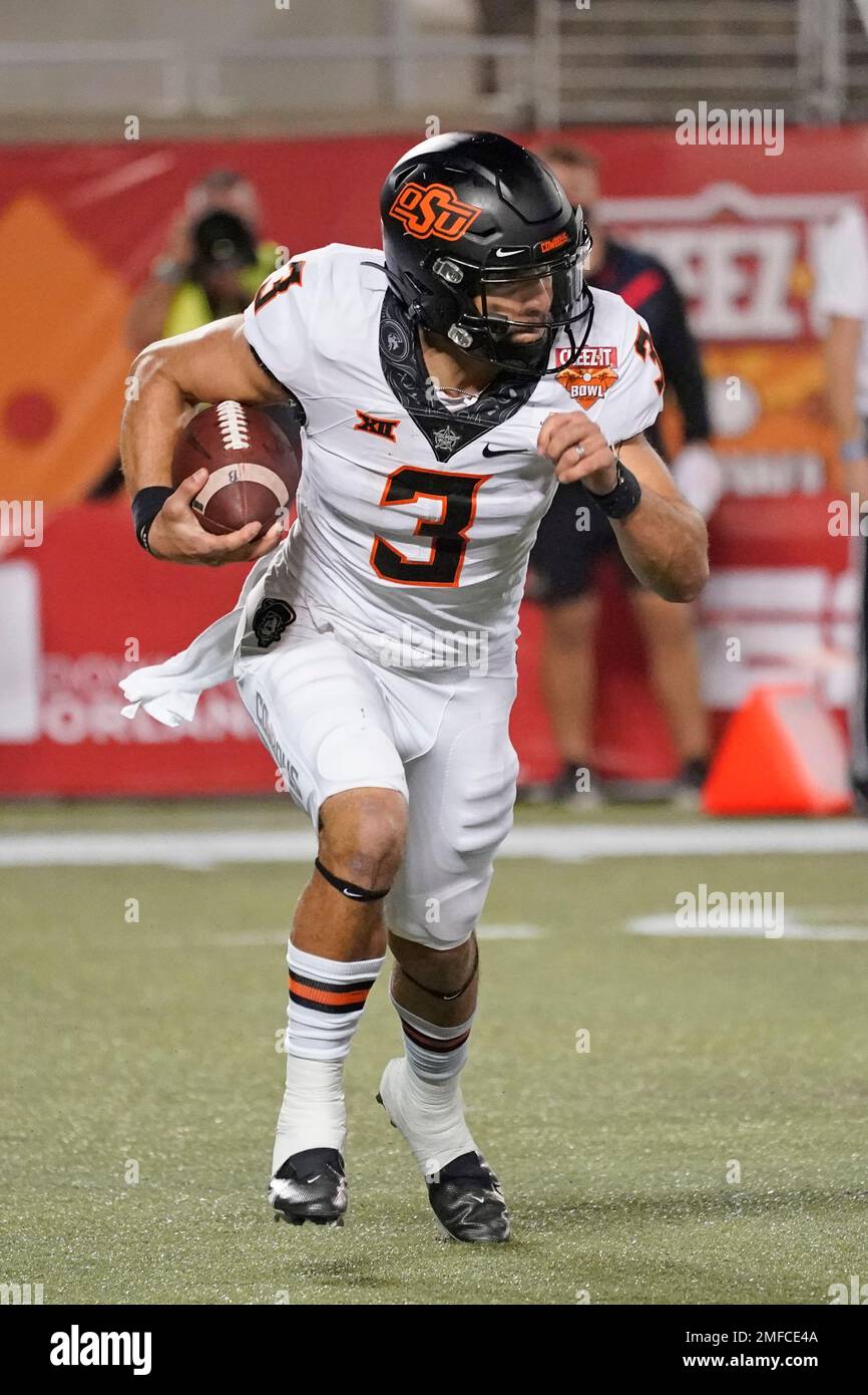 Oklahoma State quarterback Spencer Sanders (3) scrambles against Miami ...