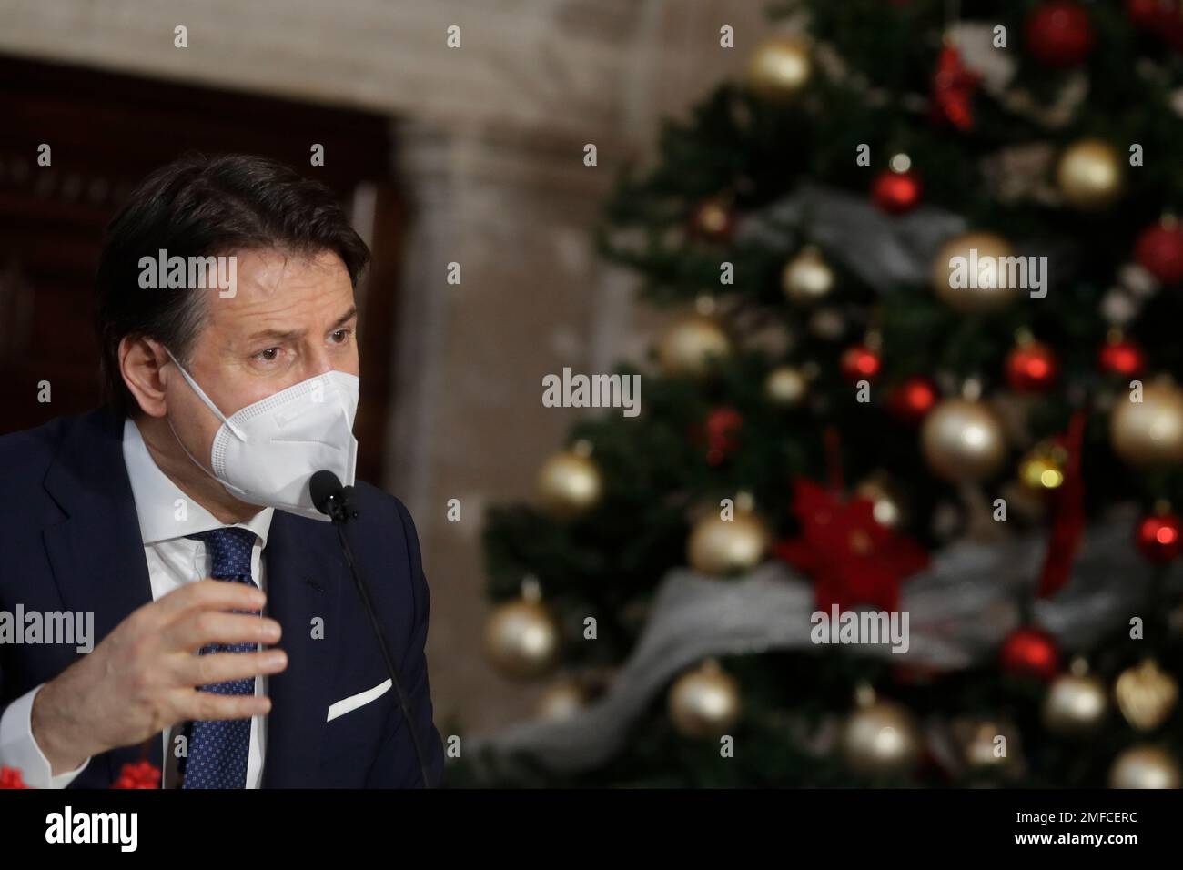 Italian Premier Giuseppe Conte wears a face mask to curb the spread of ...