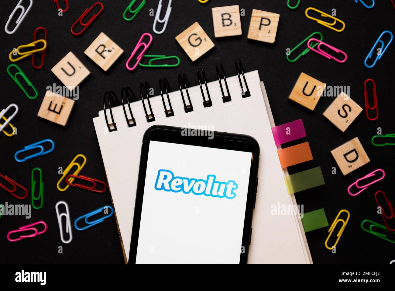 In this photo illustration, a Revolut logo seen displayed on a ...
