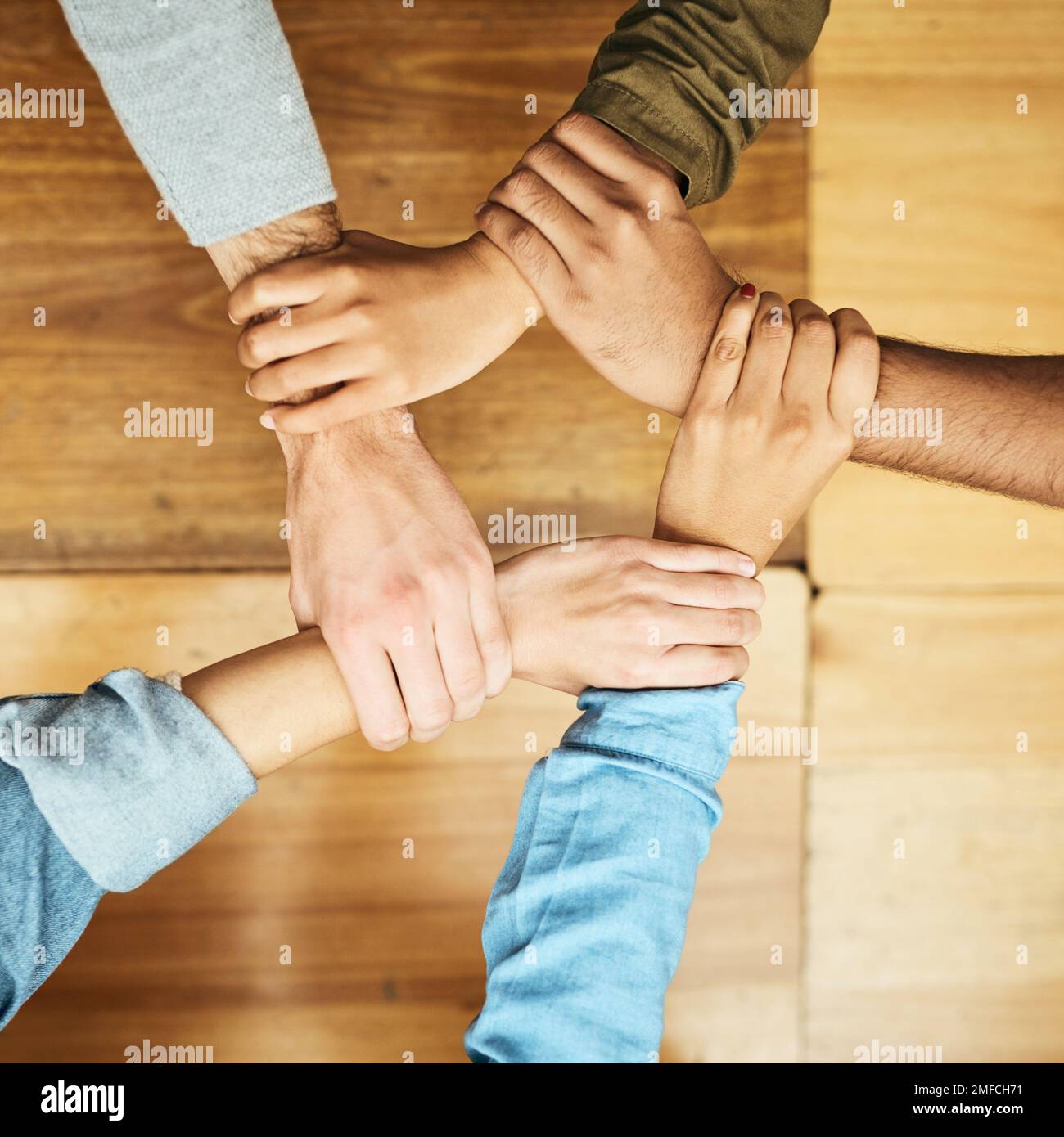 Solidarity. High angle shot of a group of unrecognizable university ...