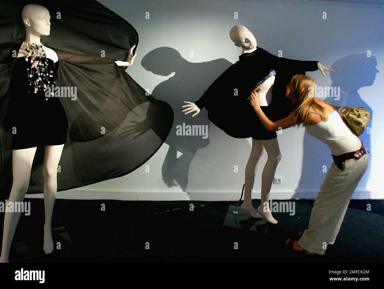 FILE - In this July 4, 2006 file photo, a woman looks at a creation by ...