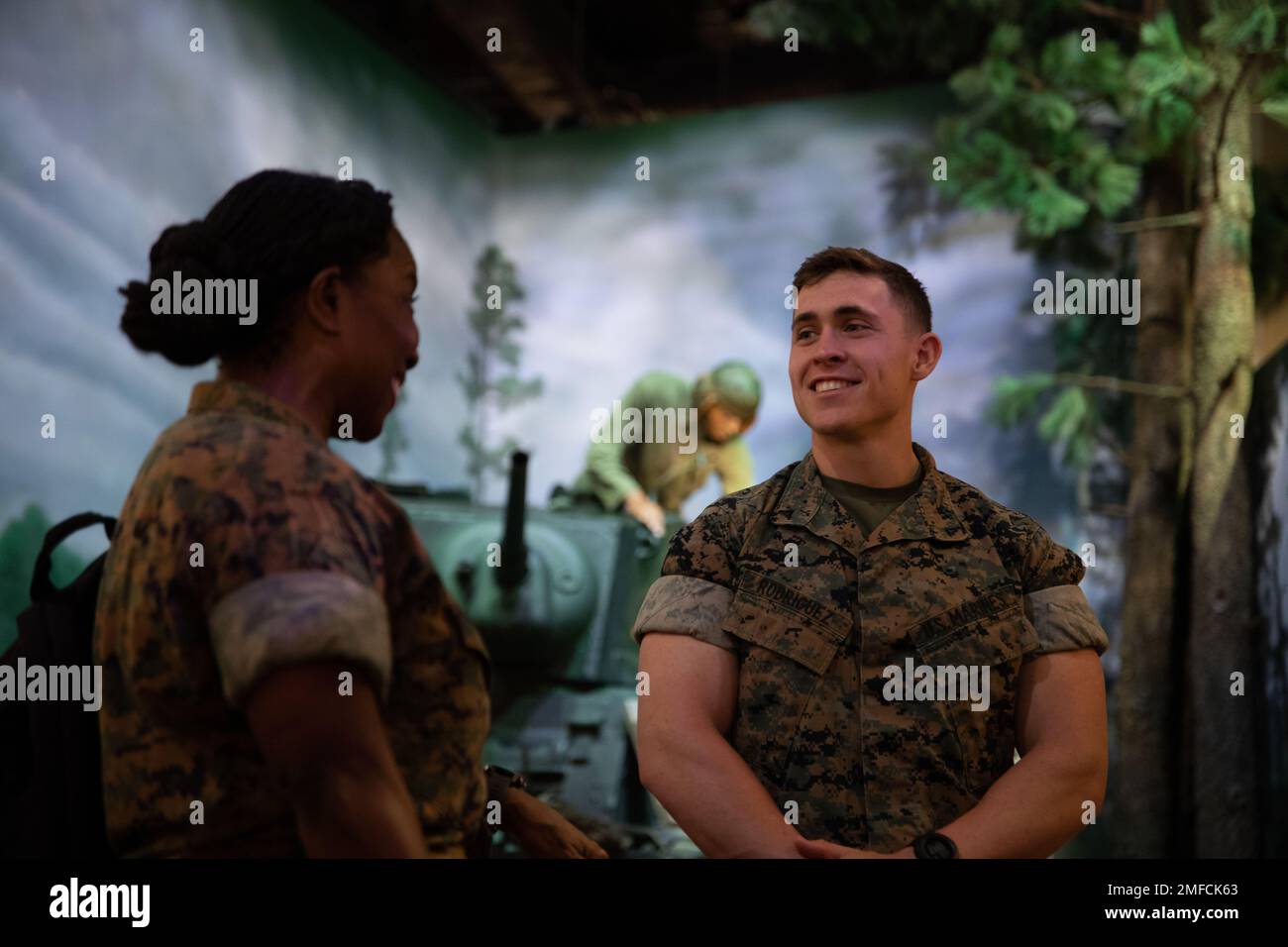 Lt. Col. Rhonda Martin (left), speaks with Lance Cpl. Michael Rodriguez ...