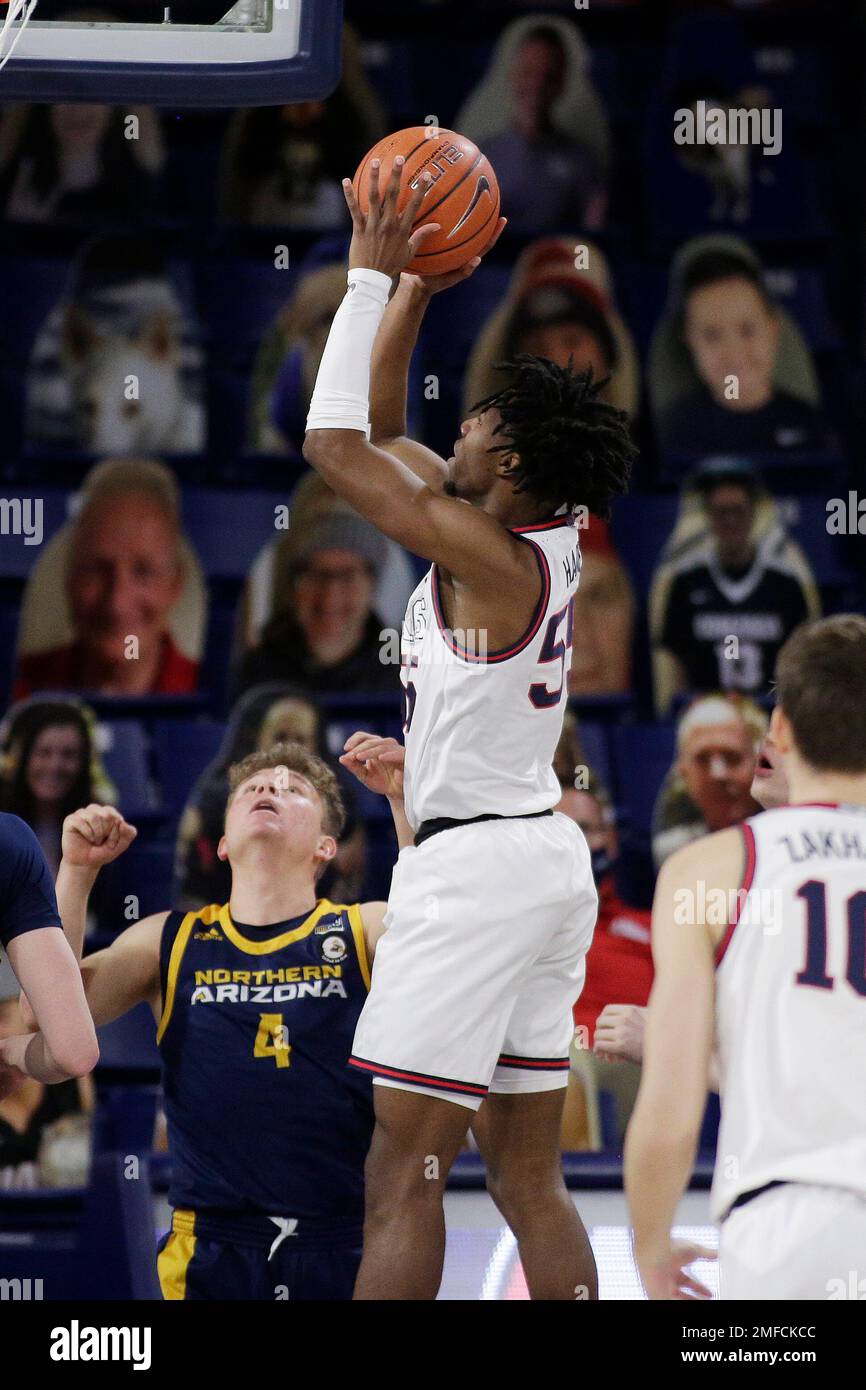 Gonzaga guard Dominick Harris, right, shoots over Northern Arizona ...