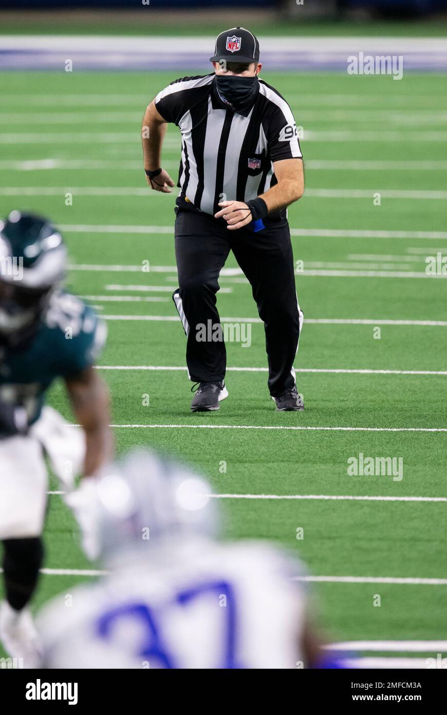 Umpire Bryan Neale watches a play between the Philadelphia Eagles and ...