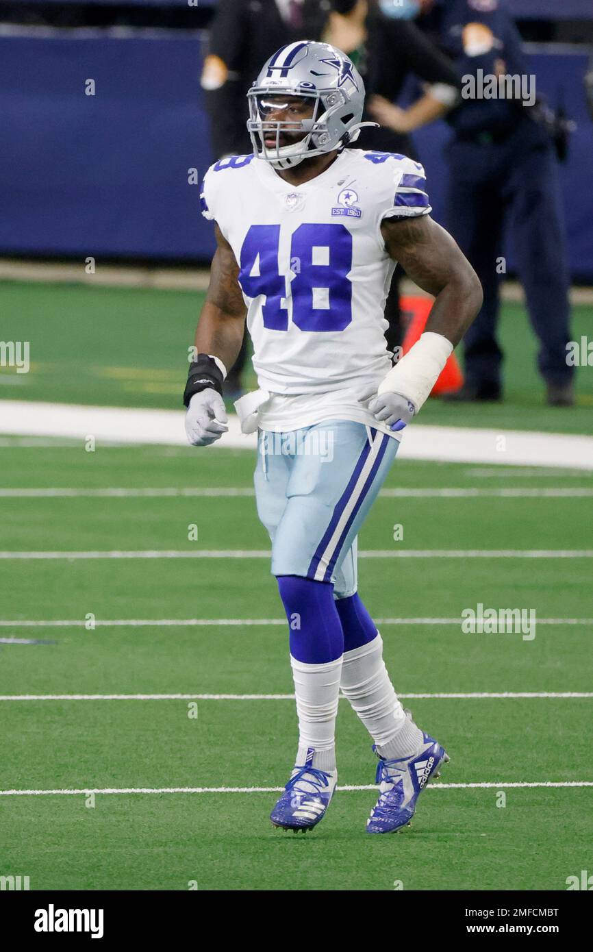 Dallas Cowboys linebacker Joe Thomas (48) jogs onto the field during an ...