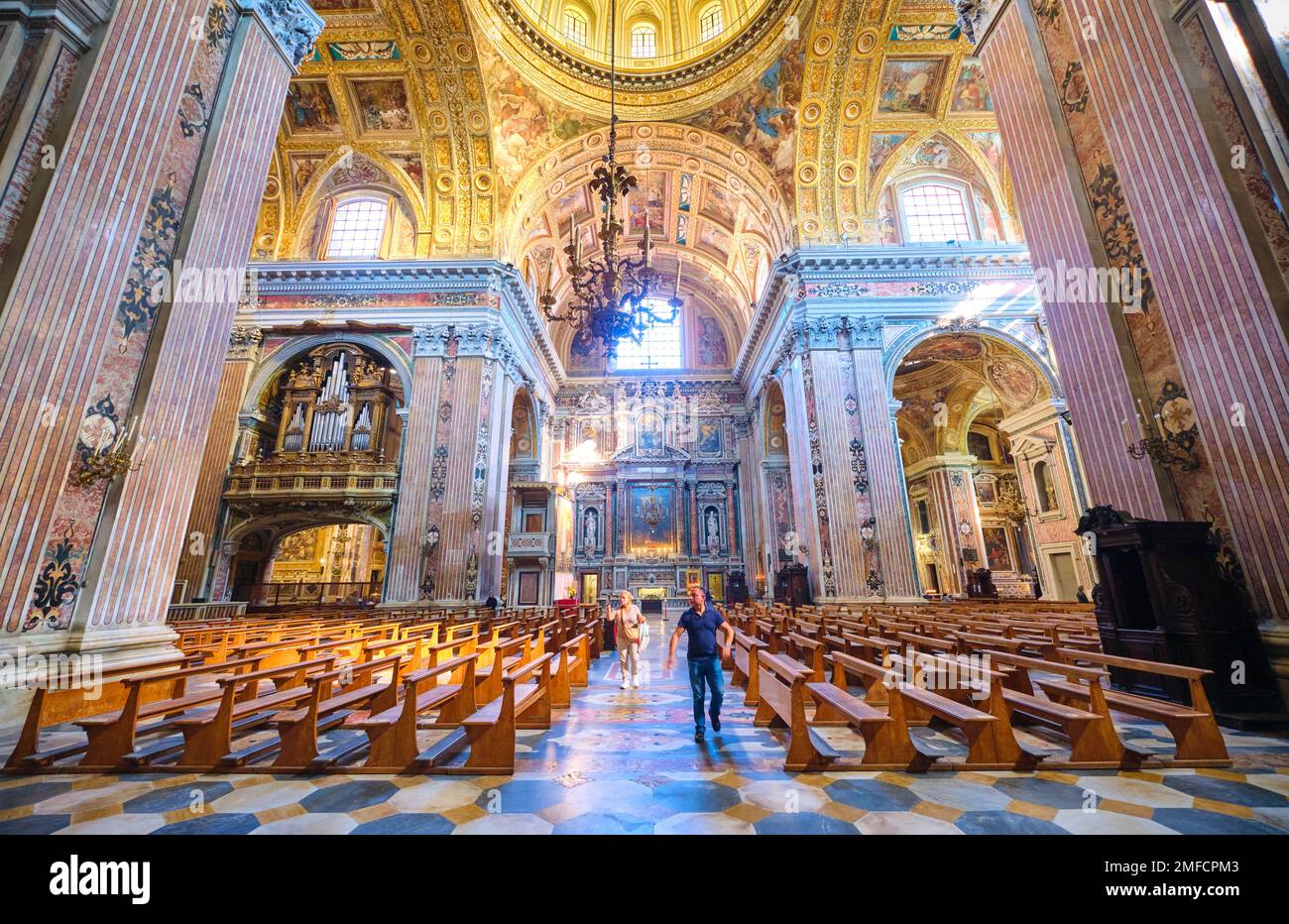 Interior view of the central nave, aisle section with soaring, gold ...
