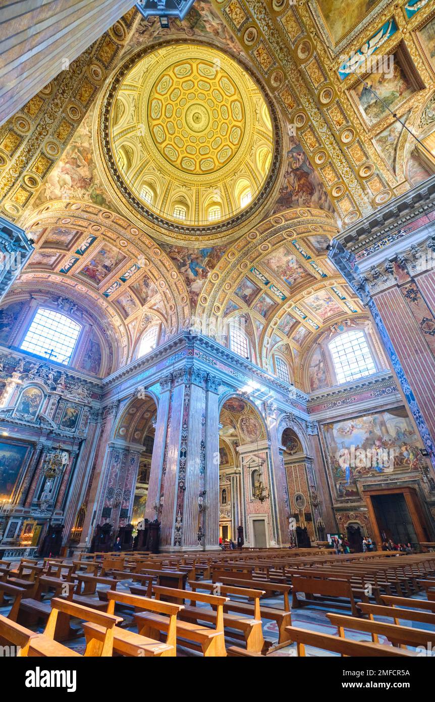 Interior view of the central nave, aisle section with soaring, gold ...