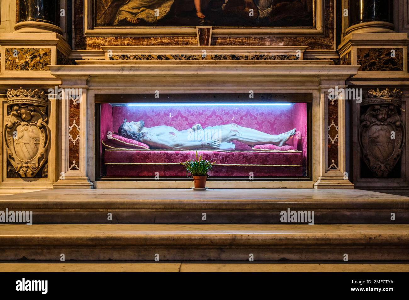 A dead Jesus Christ, lying in state in a glass case. At the Chiesa del ...