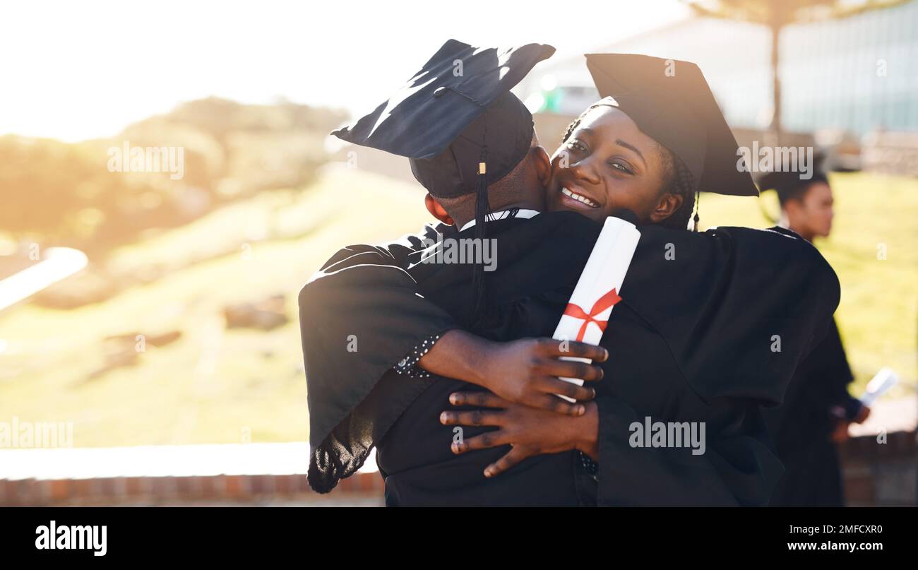Saying good bye to college life. two happy young students hugging each ...