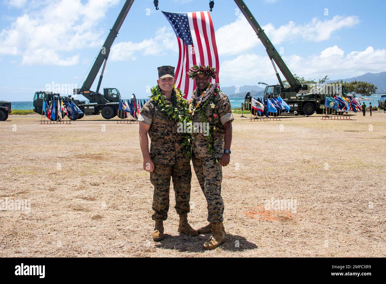 U.S. Marine Corps Sgt. Maj. Joseph J. Caputo, left, oncoming sergeant ...